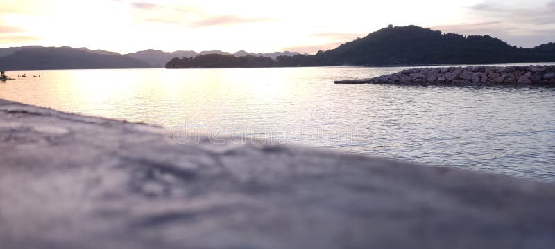Twilight at the Edge of the Pier on a Beautiful Island Stock Image ...
