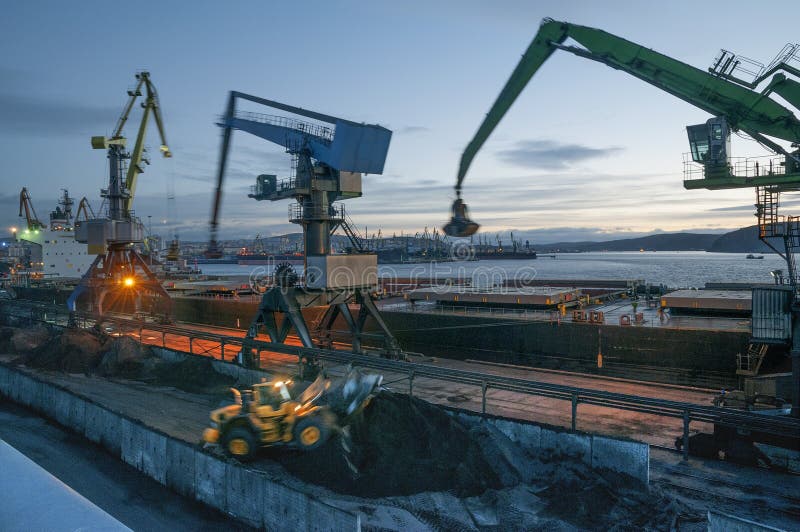 Loading Bulk Cargo into the Hold of a Bulk Carrier in the Port Stock ...