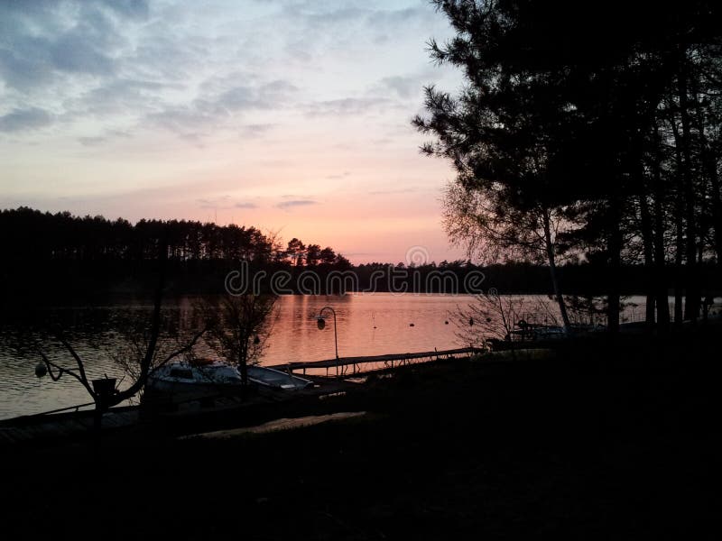 Twilight over the water stock image. Image of water - 113063759