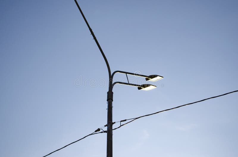 Twilight Sky. Two Lighting Street Lights Stock Photo - Image of urban ...