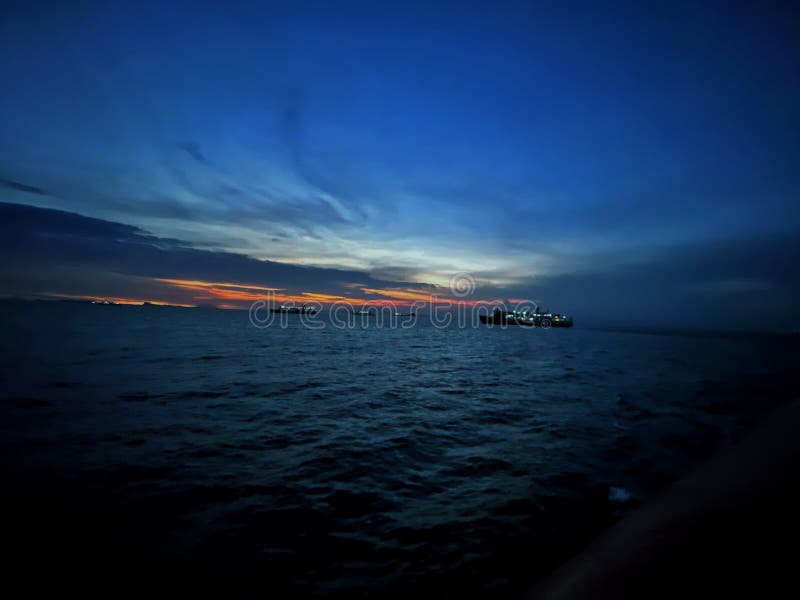 Twilight View in the Indonesia Ocean with Some of Sailing Ship Stock ...