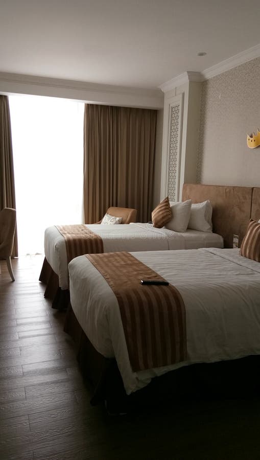 Twin Bed on Hotel Room with Dominating Grey Color Stock Image - Image ...