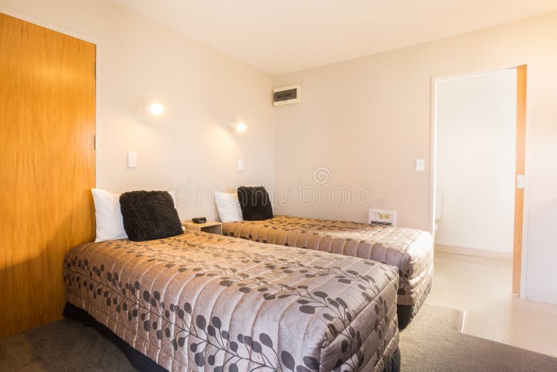 Twin bedroom stock image. Image of light, interior, beautiful - 83581267