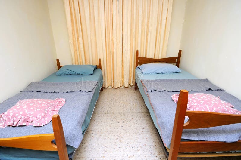Twin Beds in Simple Motel Room Stock Photo - Image of generic, clean ...