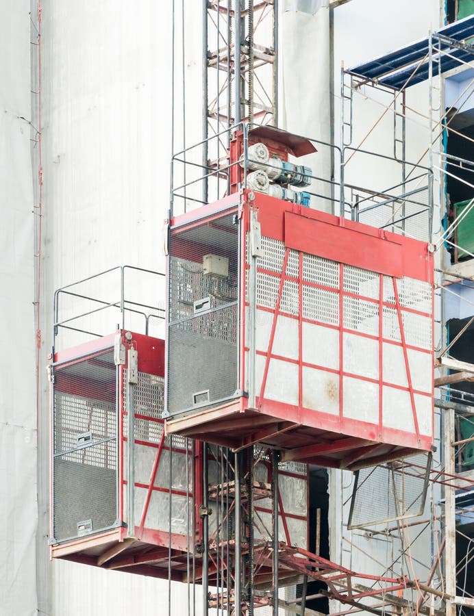 Construction Elevator Cradle for Finishing the External Facade of a ...