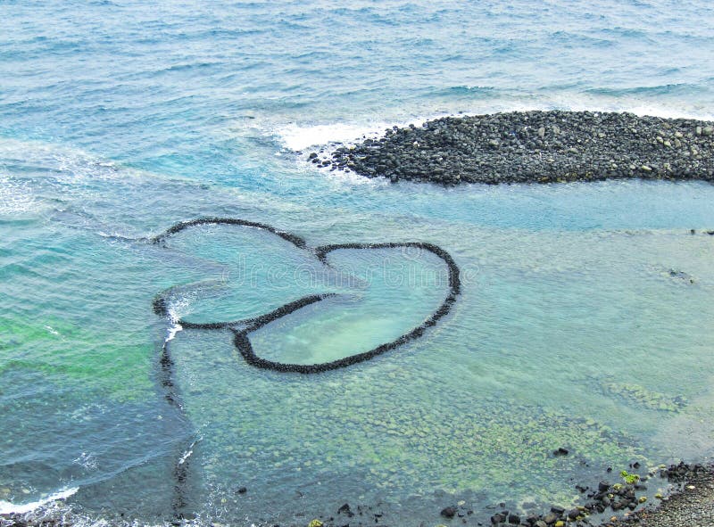 Twin-Heart Fish Trap stock image. Image of seashore, natural - 56554225