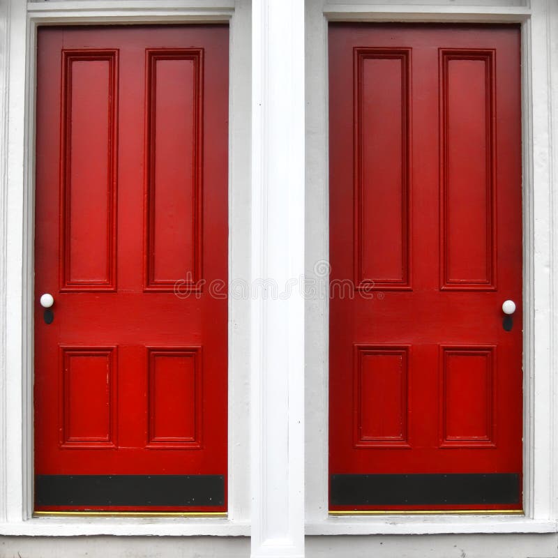 Twin Red Wood Panel Entry Door on Historic Home Stock Photo - Image of ...