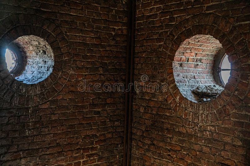Round Brick Windows in an Abandoned Tower Stock Image - Image of window ...