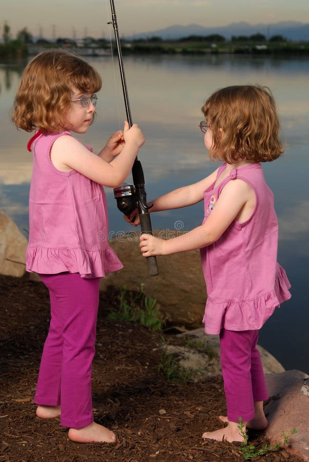 Twin Sisters Fishing stock image. Image of lake, pole - 10077035