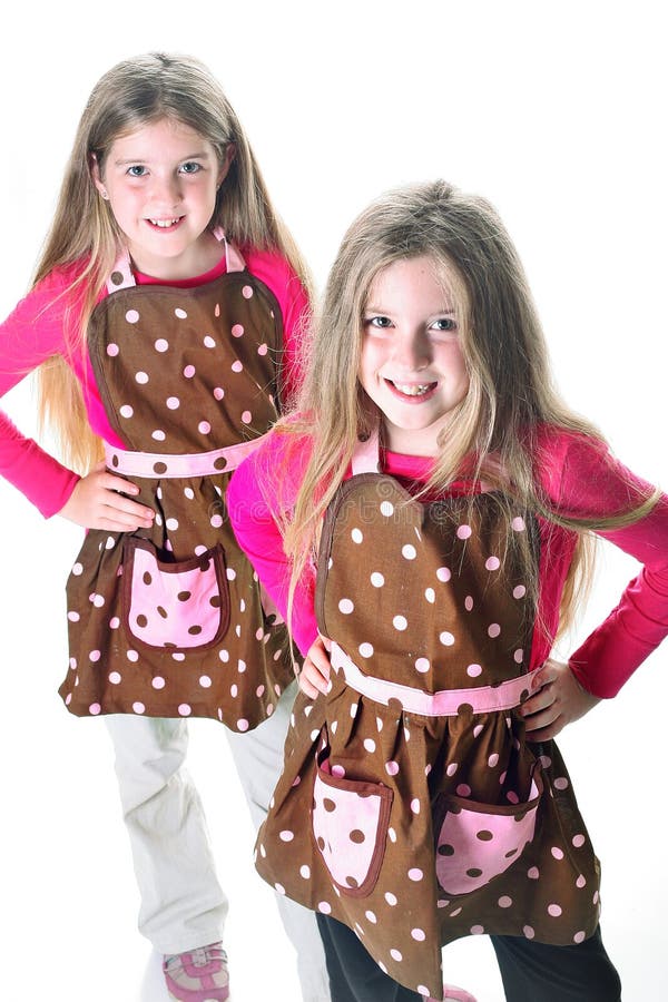 Sisters in aprons stock photo. Image of happy, polka - 11653882