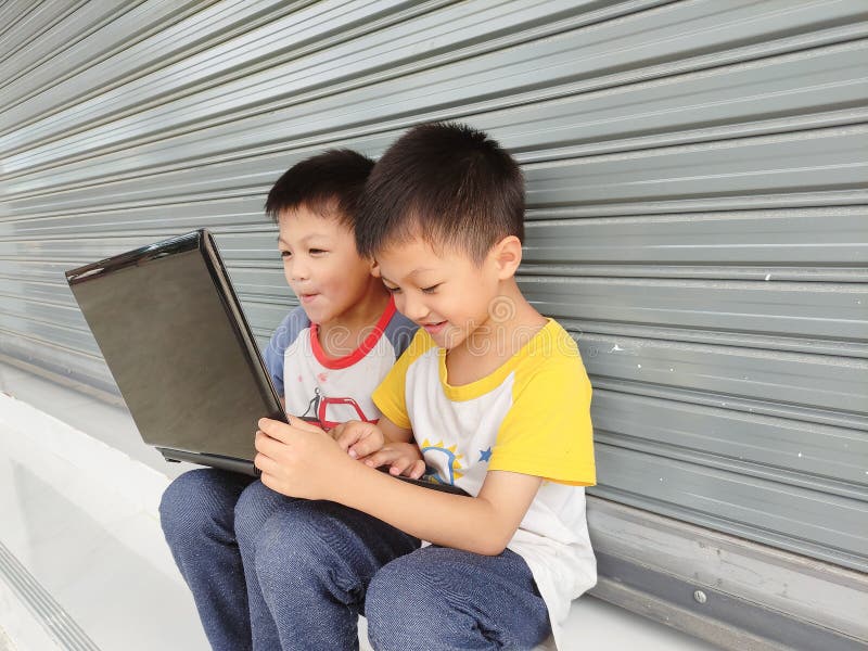 Twins Asia Boy Playing Laptop Computer Stock Image - Image of happy ...
