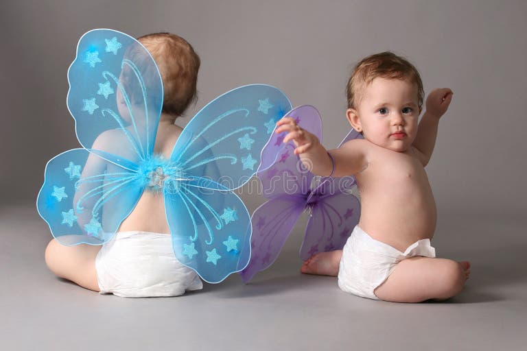 Twins with butterfly wings stock image. Image of smiling - 13405007