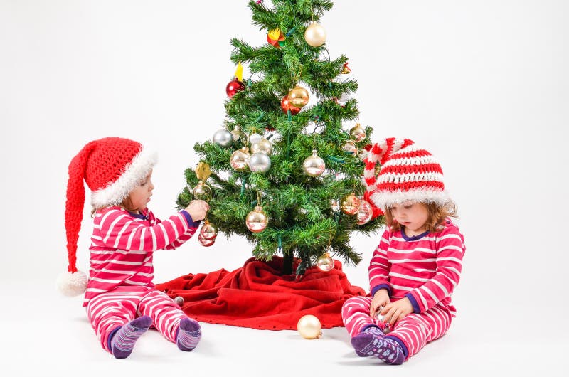 Twins and a Christmas tree stock image. Image of christmas - 38745939