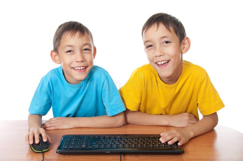 Brothers Working on Laptop Computer Sitting on Floor Stock Photo ...