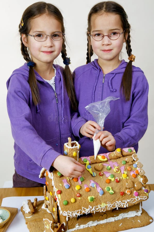 Twins decorating stock photo. Image of cottage, gingerbread - 7976048