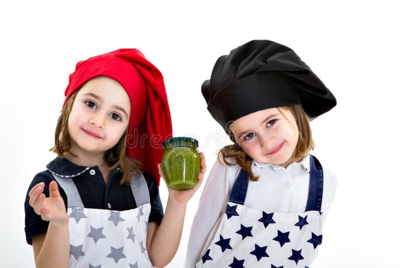 Twins Sisters Cook Chef with Pesto Genovese Stock Photo - Image of ...