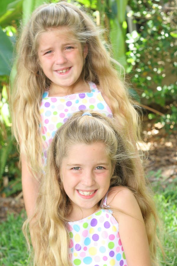 Twins stacked outside stock photo. Image of person, fashion - 6601134