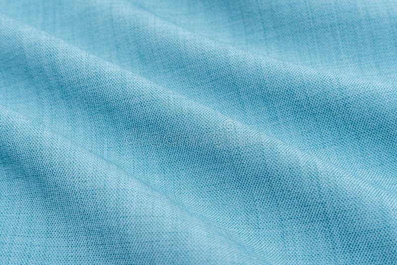 A Twisted Bunch of Blue Fabric with Folds and Waves. Linen Material ...