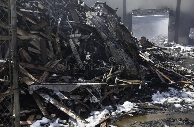 Twisted Burnt Rubble from Warehouse Fire Stock Photo - Image of ...