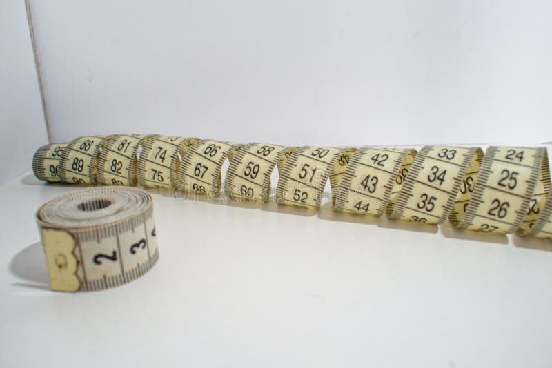 Twisted Centimeters on a White Background. Measuring Tape Isolate Stock ...