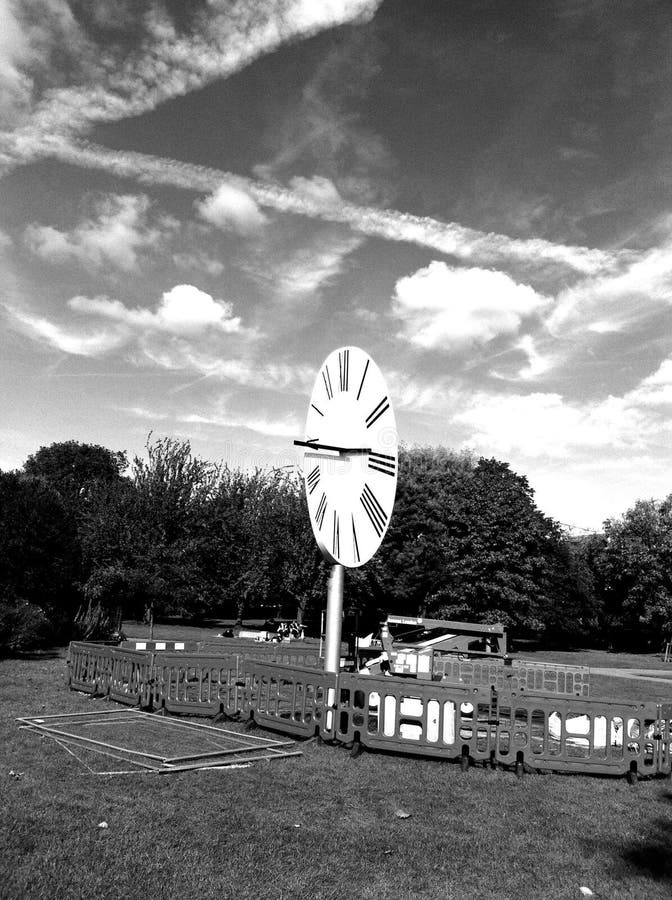 Twisted time on clock face stock photo. Image of fades - 25394452