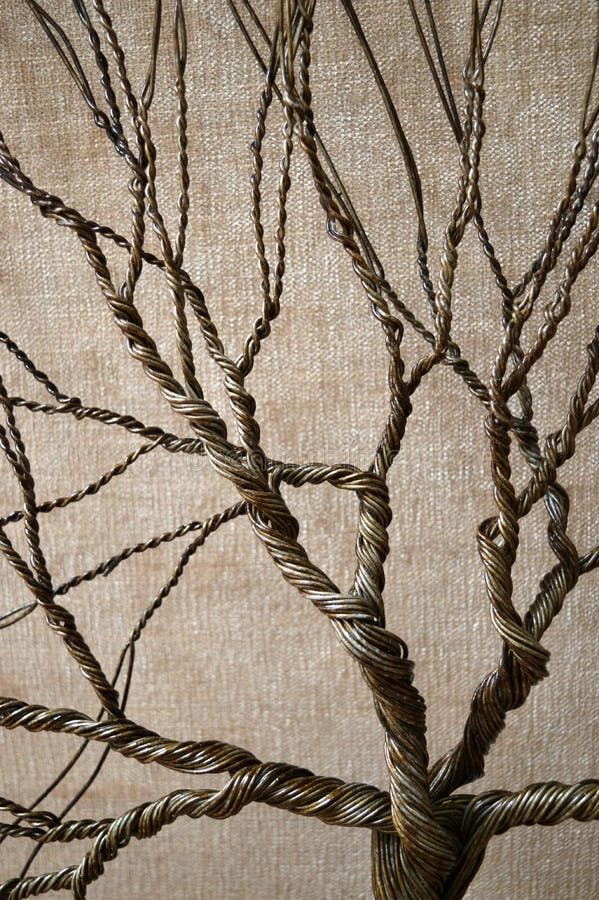 Twisted Wire Forming a Tree with a Textured Background Stock Photo ...