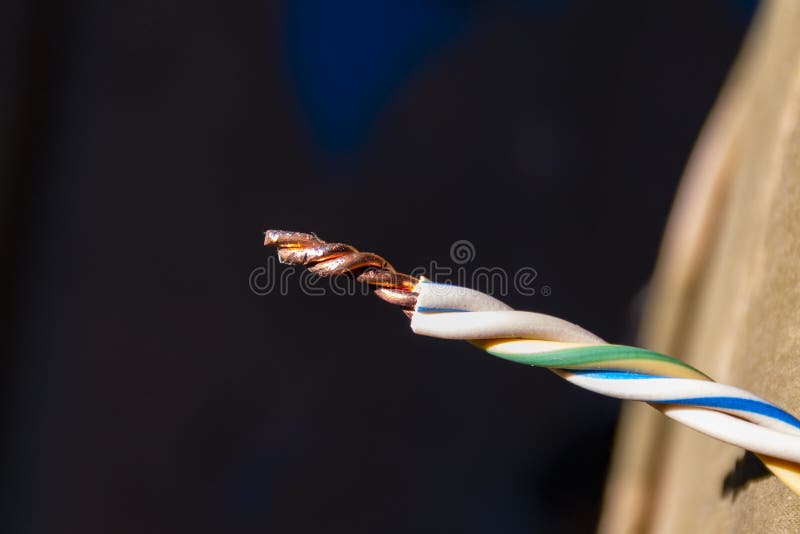 The Twisting of Copper Electrical Wires Isolated on White Background ...