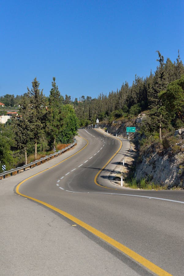 The Twisting Road in the Wood Stock Photo - Image of dirt, forest: 63907866