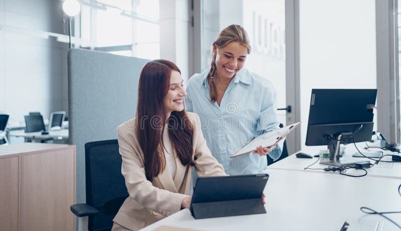 Women in Modern Offices Collaborate Creatively To Achieve Goals and ...