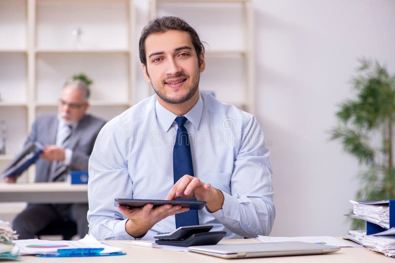 Two Accountants Working in the Office Stock Photo - Image of accountant ...