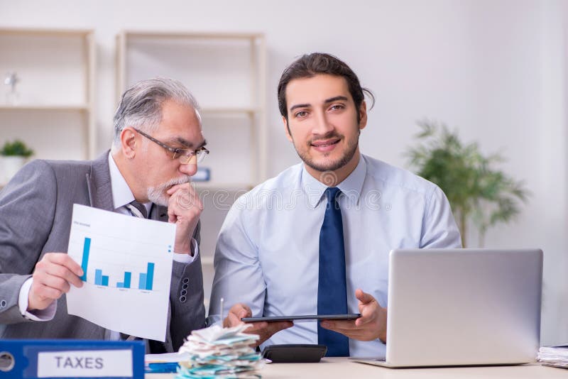 Two Accountants Working in the Office Stock Image - Image of chart ...