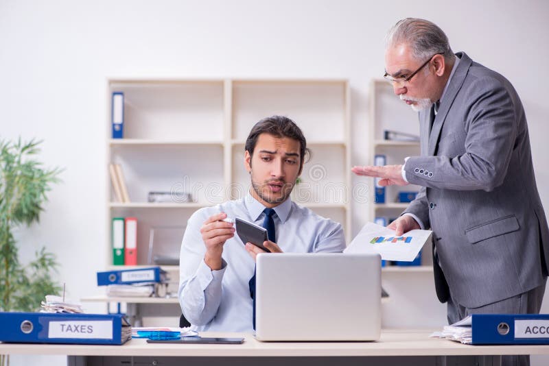 Two Accountants Working in the Office Stock Photo - Image of computer ...