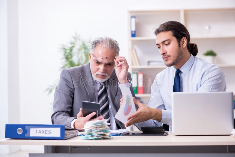 Two Accountants Working in the Office Stock Photo - Image of manager ...