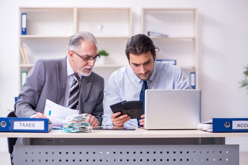 Two Accountants Working in the Office Stock Photo - Image of busy, boss ...