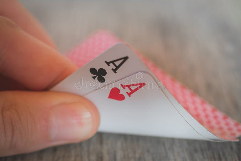 Two Aces, Playing Cards in Hand on the Table, Poker Nands Stock Photo ...