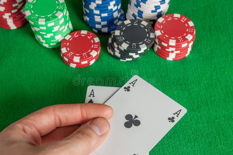 Two Aces and Poker Chips Stack on Green Table Stock Photo - Image of ...