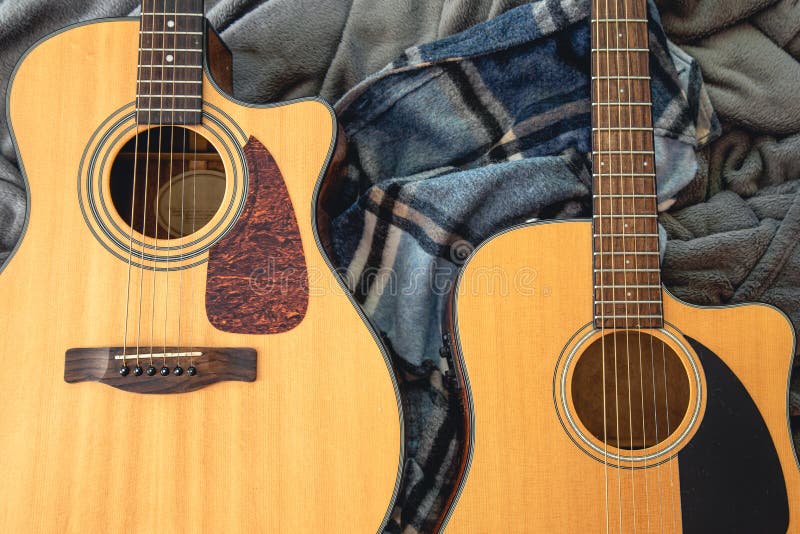 Two Acoustic Guitars on a Cozy Plaid, Top View. Stock Photo - Image of ...