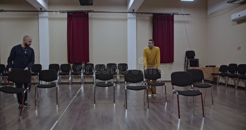 Two Actors Rehearse on a Theater Stage, Preparing for a Performance ...