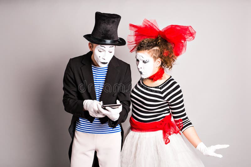 Two Actors Using Digital Tablet Over White Background. Horizontal Shot ...