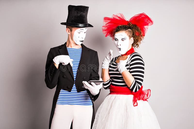 Two Actors Using Digital Tablet Over White Background. Horizontal Shot ...