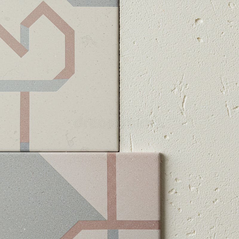 Two Adjacent Square Tiles with Geometric Patterns Featuring Muted Pink ...