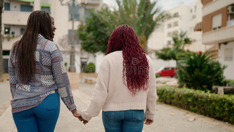 Two African American Friends Smiling Confident Walking on Back View at ...