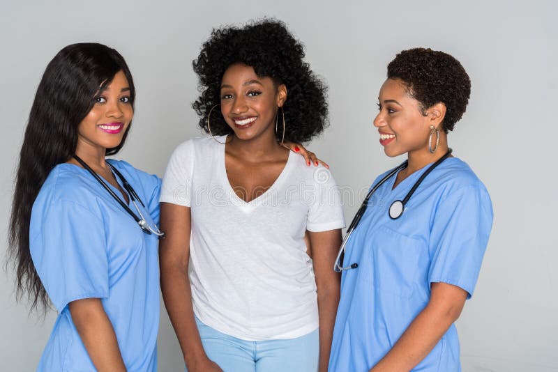 Two Nurses with Patient stock image. Image of sick, pretty - 118882135