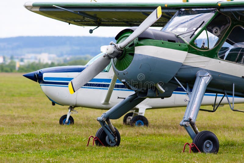 Two Airplanes on the Airfield Stock Image - Image of flying, ground ...
