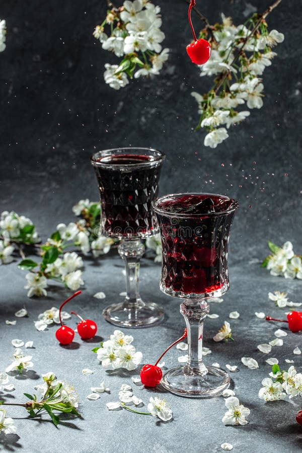 Two Alcohol Cherry Shot, with Fresh Berries and Blossoms, Berry ...