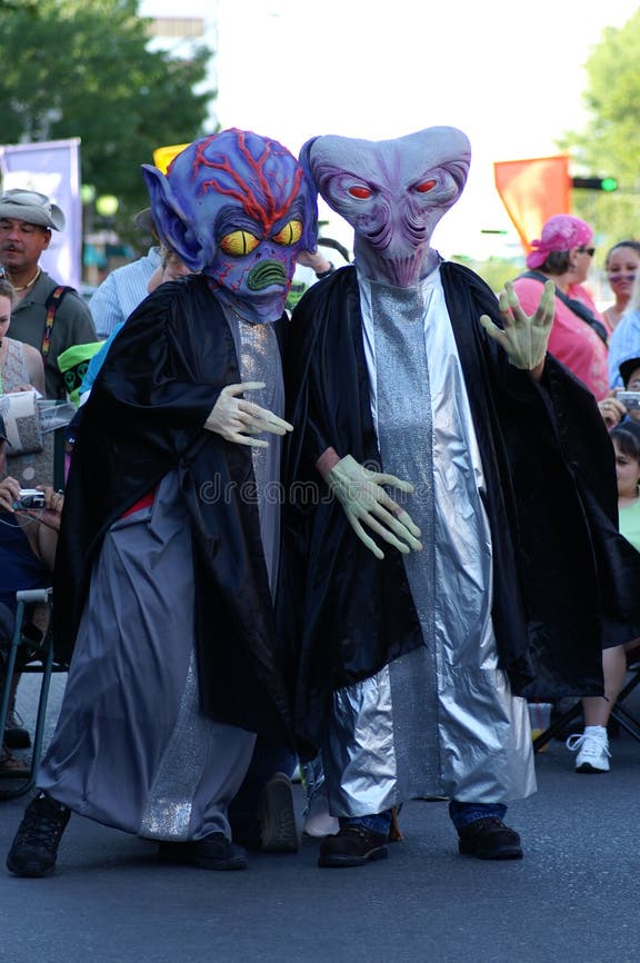 Two Aliens Playing editorial image. Image of events, friends - 4214285
