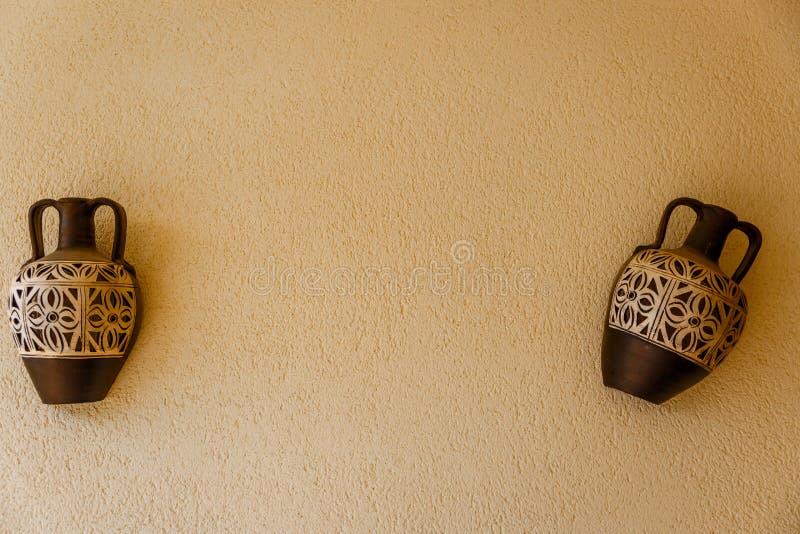 Two Amphoras Decorating the Wall of a Patio Stock Image - Image of ...