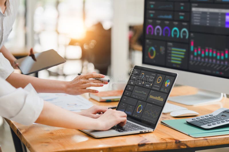 Two Analyst Women Using KPI Dashboard for Data Analytics. Digital Data ...