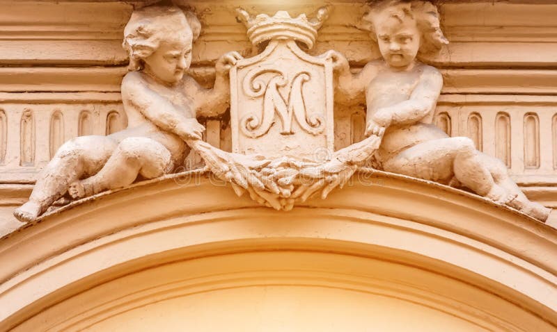 Two Ancient Angels in the Form of Children on the Building Architecture ...