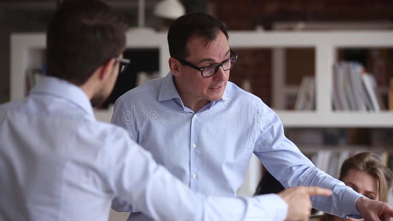 Two Angry Businessmen Arguing Having Conflict Confrontation at ...